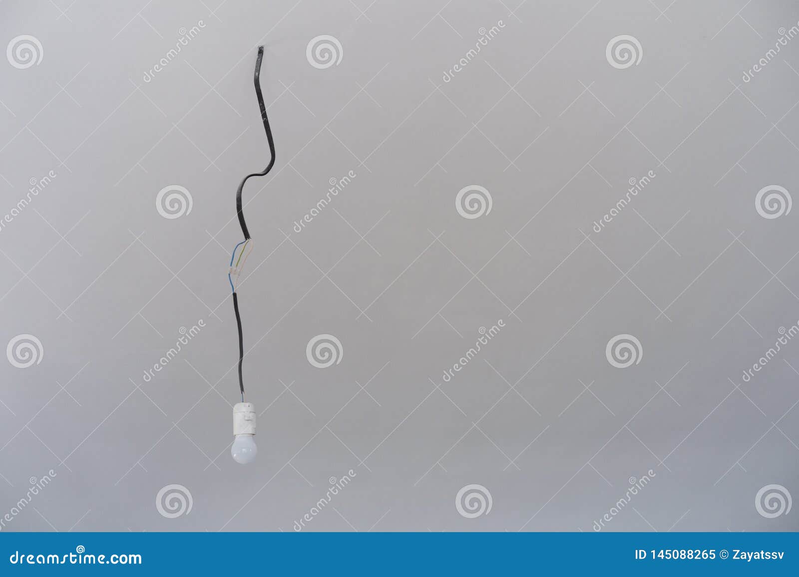 Light Bulb Hanging on the Wire in the White Room Stock Image - Image of ...