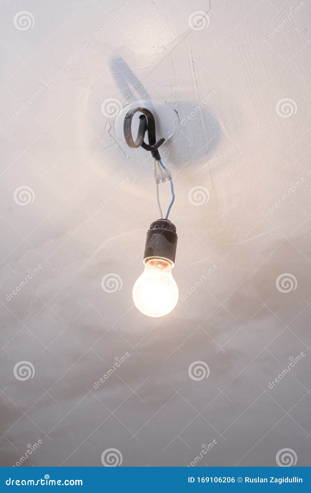 Light Bulb Hanging on Wires on White Ceiling Stock Photo - Image of ...