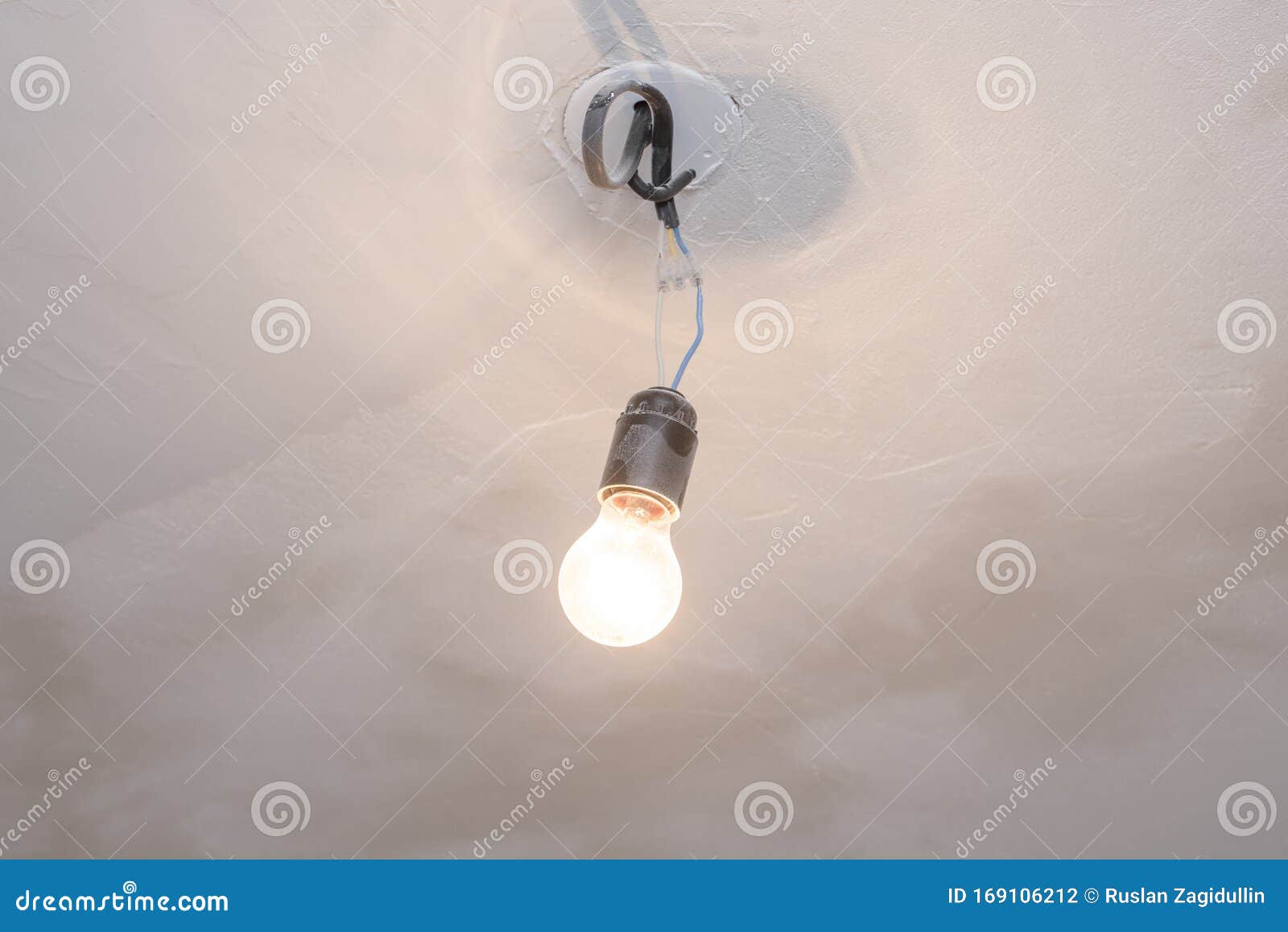 Light Bulb Hanging on Wires on White Ceiling Stock Photo - Image of ...