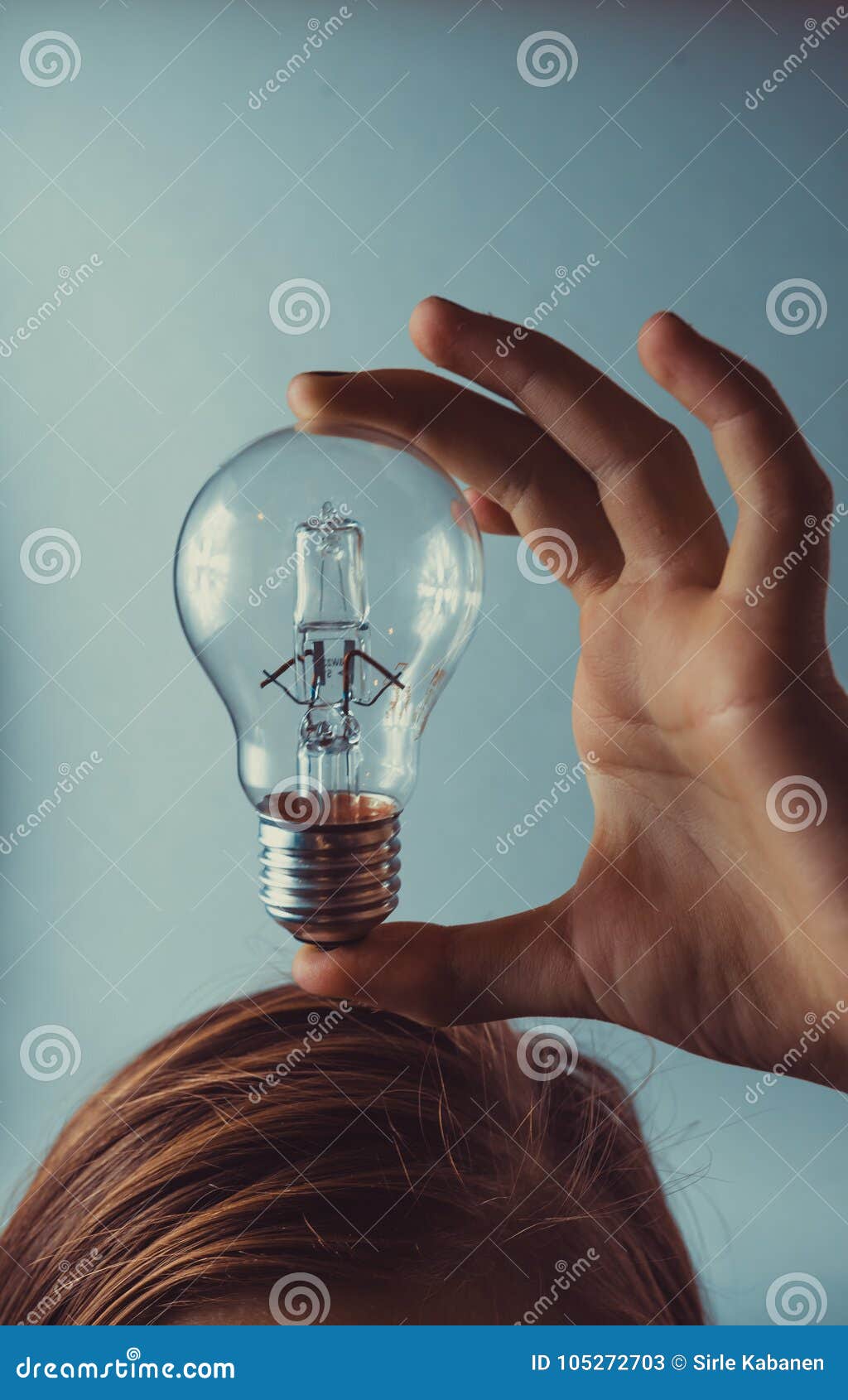 Light Bulb Idea Concept. Girl Holding Light Bulb on Head Stock Image ... Light Bulb Idea Concept. Girl Holding Light Bulb on Head Stock Image ...