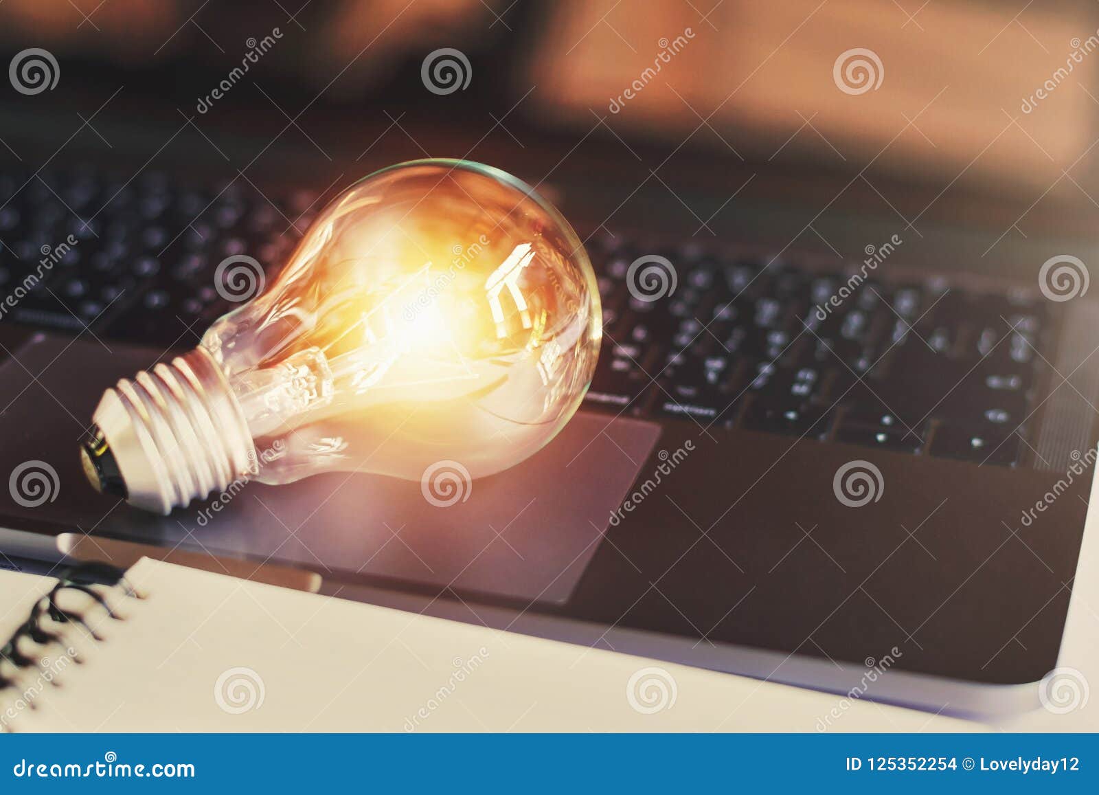 Light Bulb on Laptop Concept Saving Stock Photo - Image of lamp ...