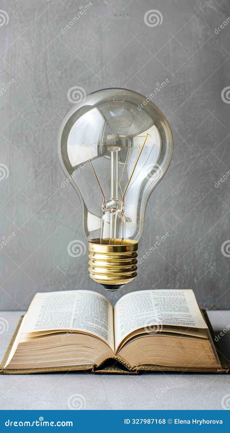 Light Bulb Levitating Above an Open Book Concept Invention Learning ...