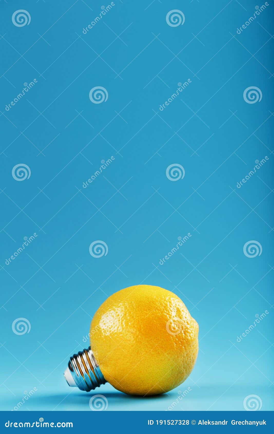 The Light Bulb is Like a Lemon on a Blue Background Stock Photo - Image ...