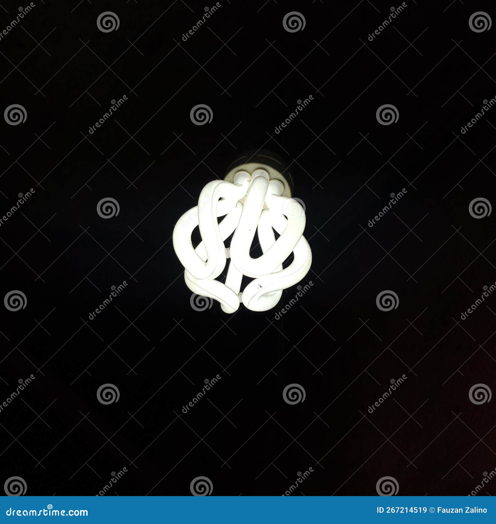 A Light Bulb Mounted on the Wall Stock Image - Image of black, iron ...