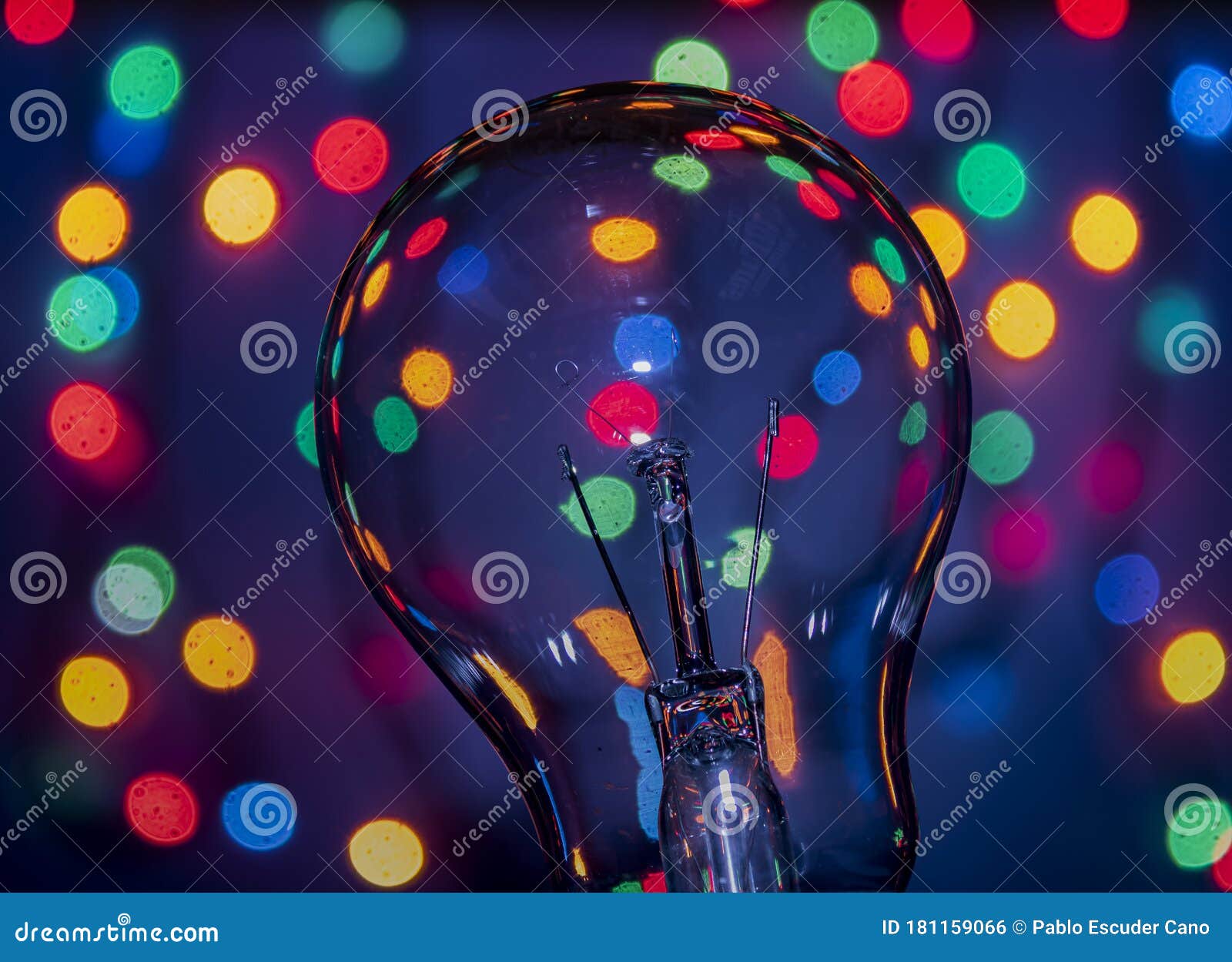 Light Bulb on Multicolored Lights Background. Stock Photo - Image of ...