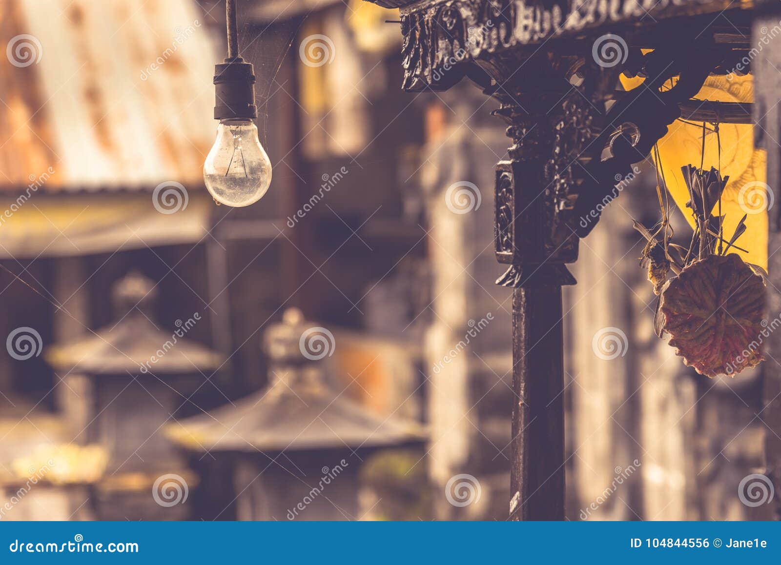 Light Bulb in Balinese Temple. Stock Photo - Image of asia, bali: 104844556