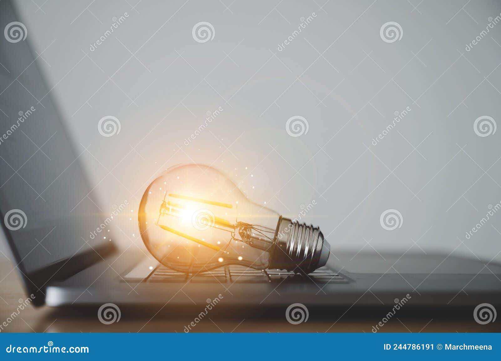 Light Bulb Putting on Computer Laptop Stock Image - Image of light ...