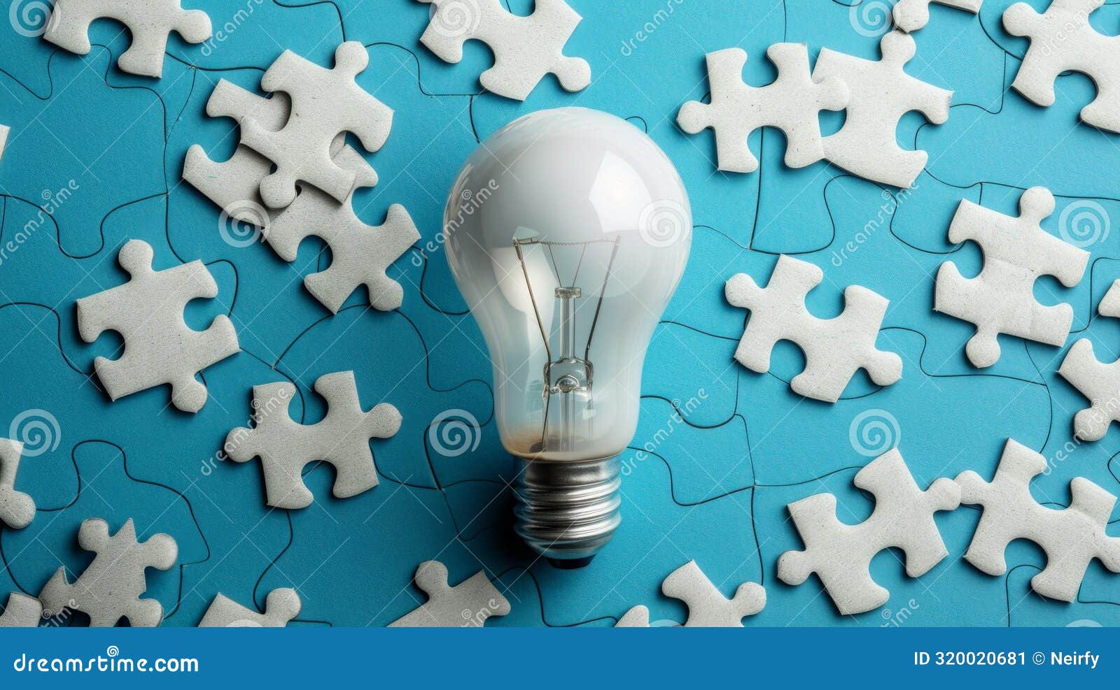 Light Bulb with Puzzle Pieces Concept on Blue Background. Stock Image ...