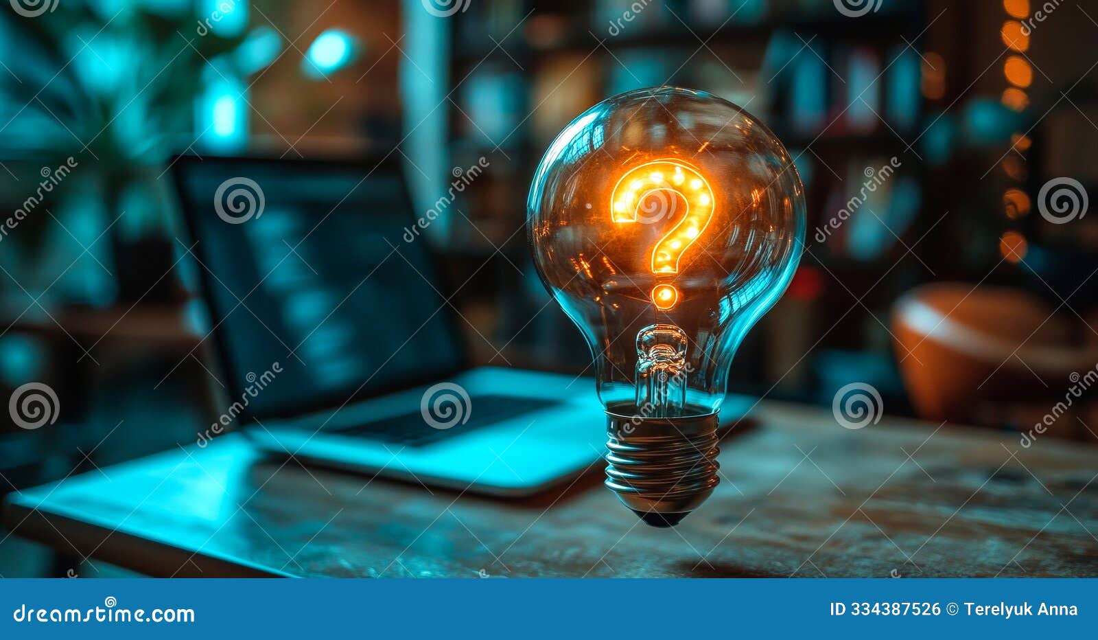 A Light Bulb with a Question Mark Inside of it is Lit Up Stock Photo ...