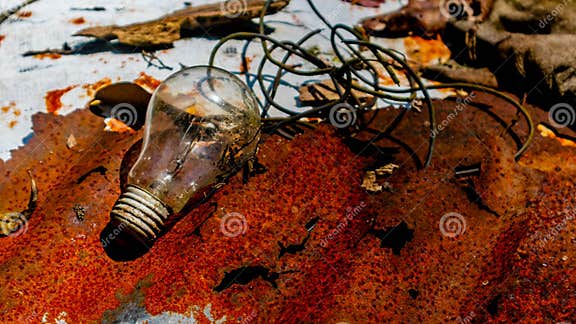 Light Bulb on Rusty Zinc As a Background Stock Photo - Image of ...