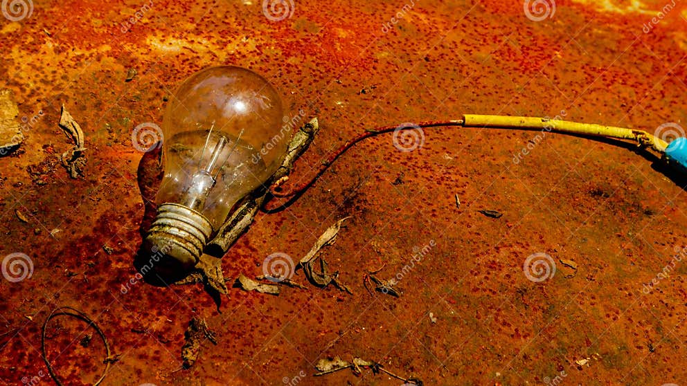 Light Bulb on Rusty Zinc As a Background Stock Photo - Image of ...