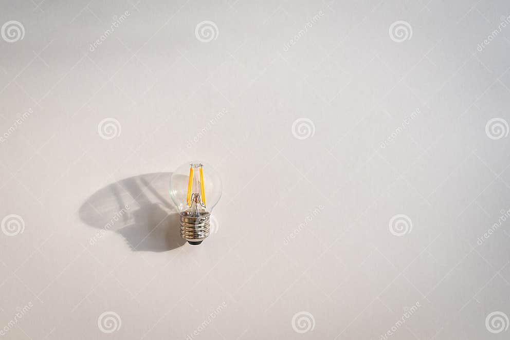 Light Bulb and Shadow on White Board Background Stock Image - Image of ...