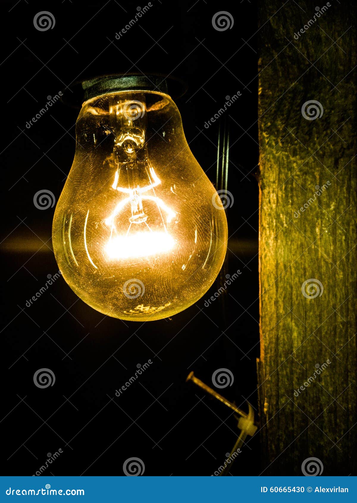 Light Bulb Shinning In The Dark Stock Photo - Image: 60665430