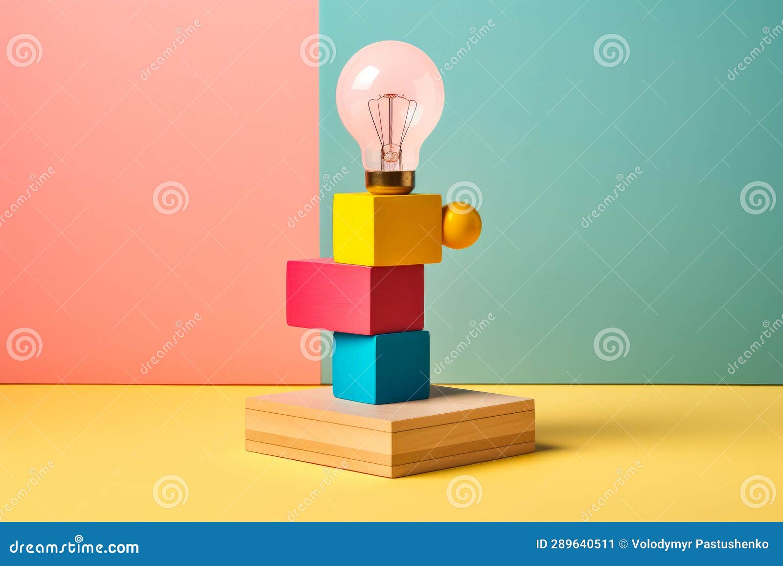 Light Bulb Sitting on Top of Block Structure with Yellow Ball ...