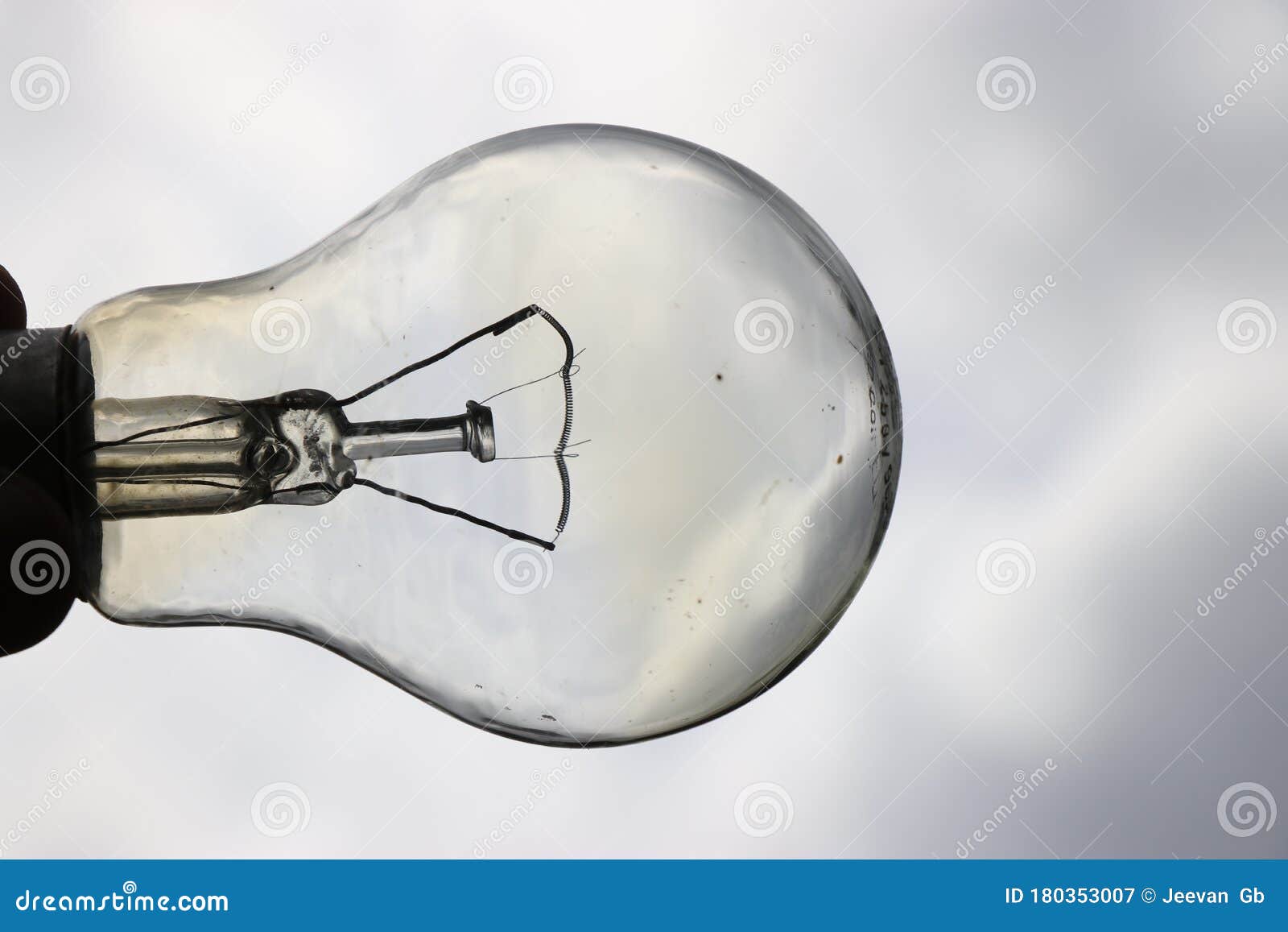 Light Bulb on Sky Background Indicating Business Idea Concept Stock ...