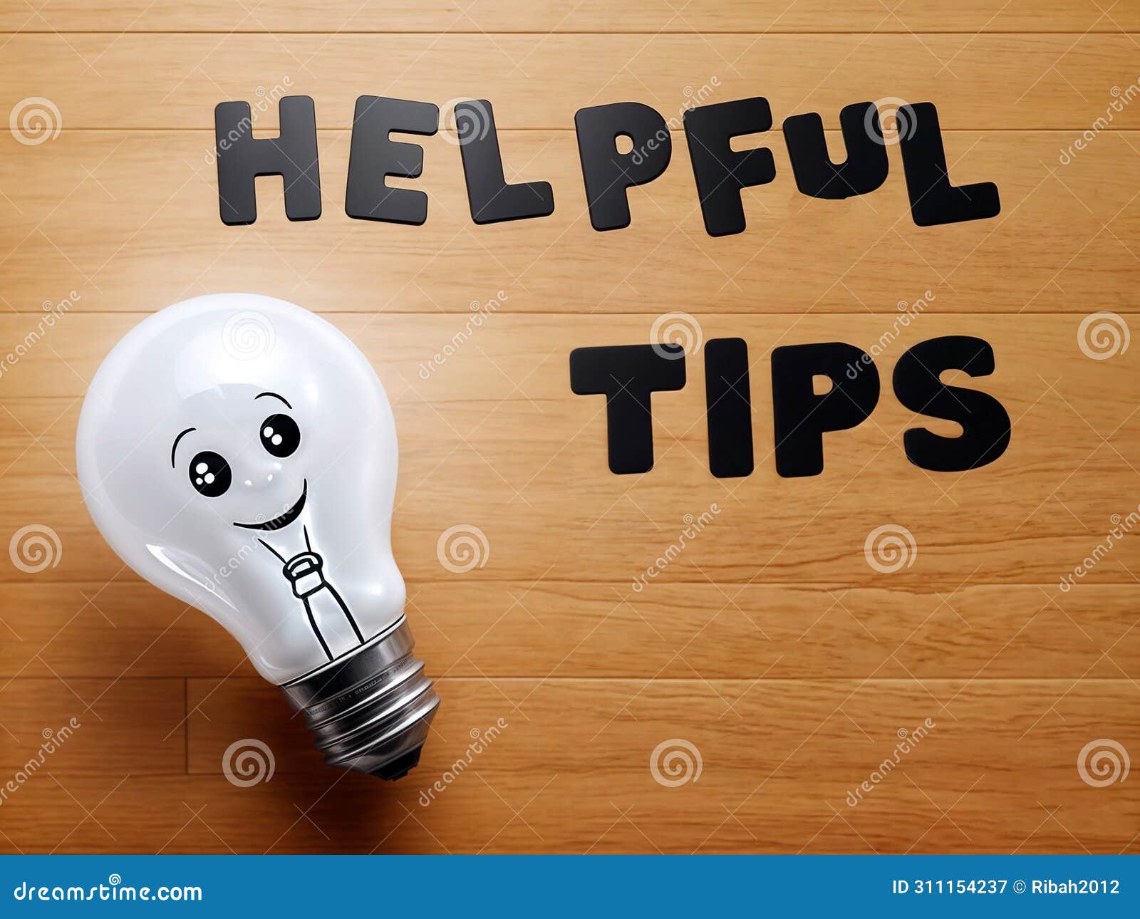 A Light Bulb with a Smiling Face Drawn on it, Next To the Text Words ...