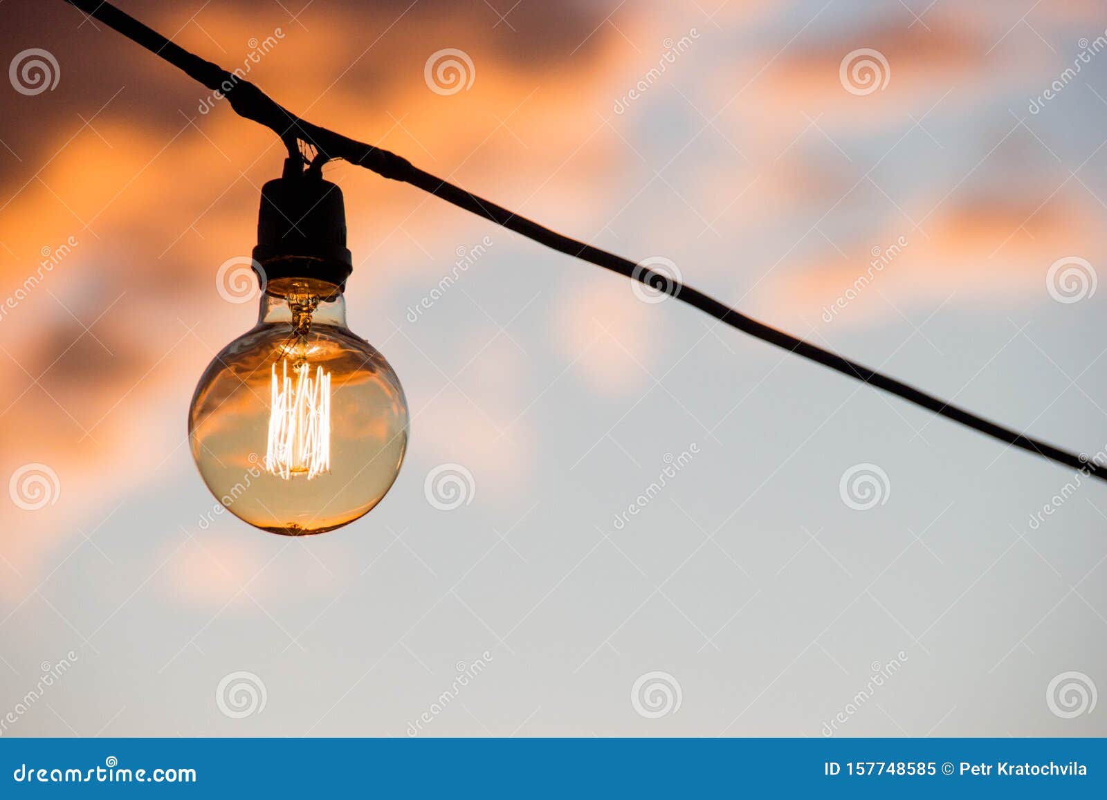 Light bulb and sunset stock image. Image of abstract - 157748585