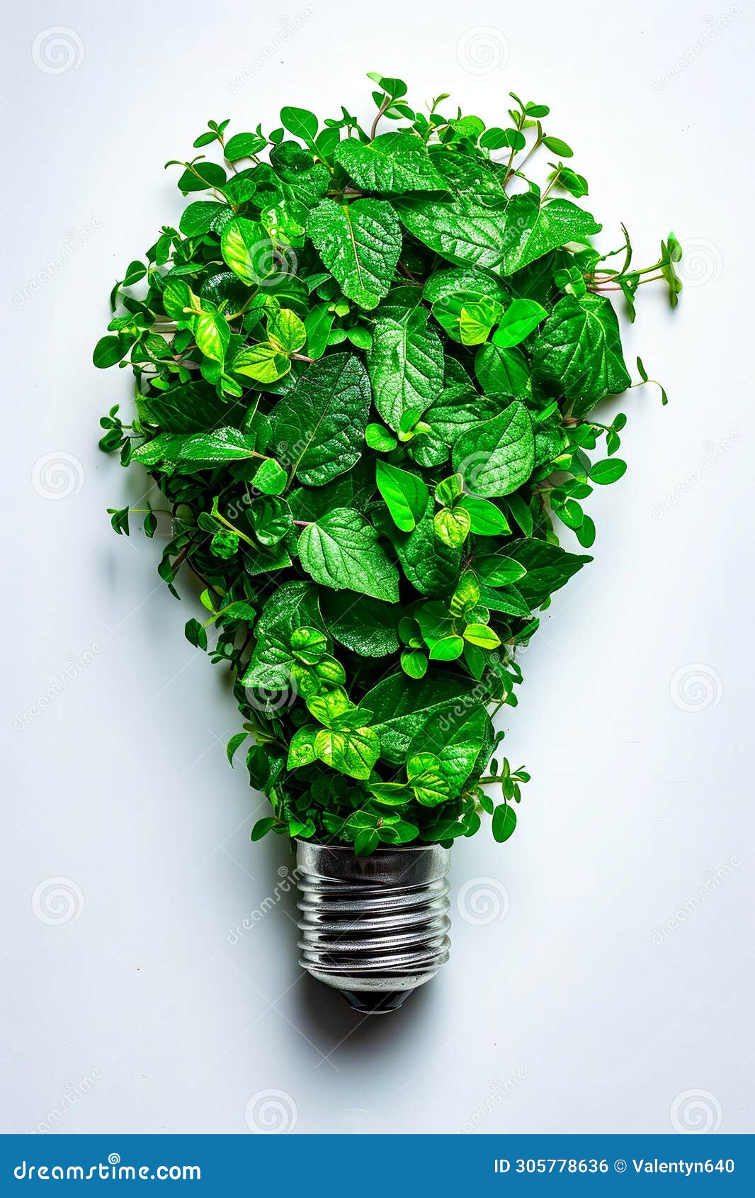 Light Bulb is Surrounded by Green Plants Creating Interesting and Eco ...