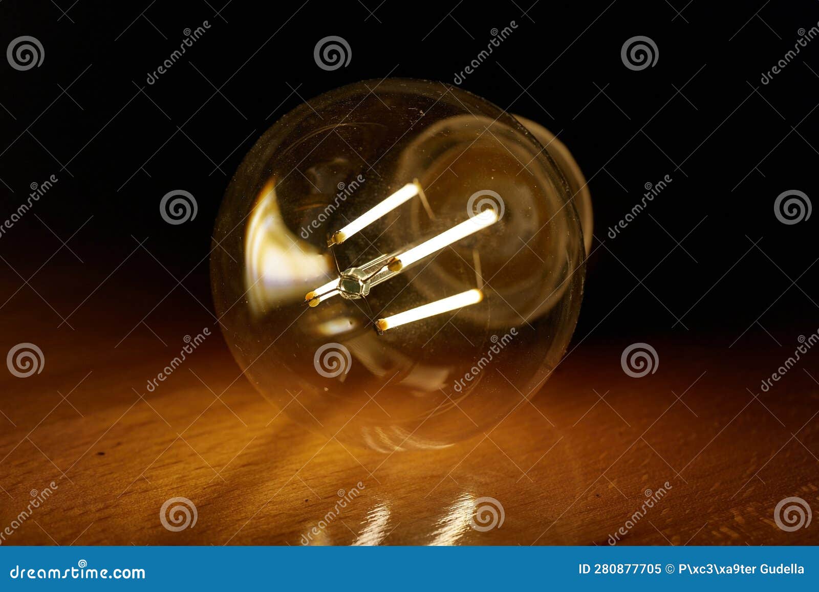 Light bulb on a table stock image. Image of bulb, circuit - 280877705