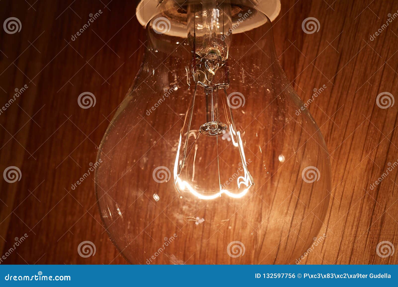 Light bulb on a table stock photo. Image of flicker - 132597756