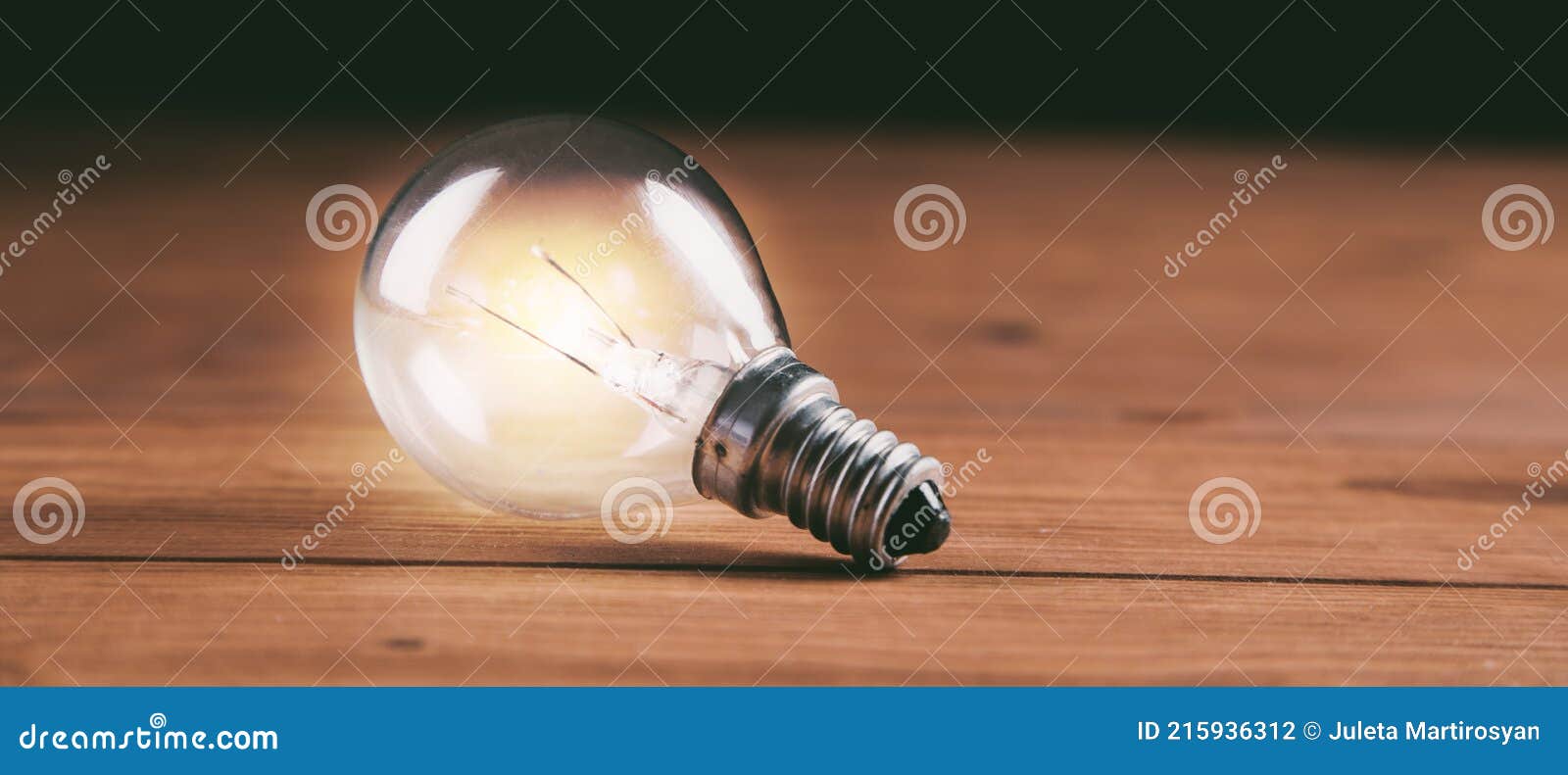 Light Bulb on the Table New Ideas Stock Photo - Image of ideas ...