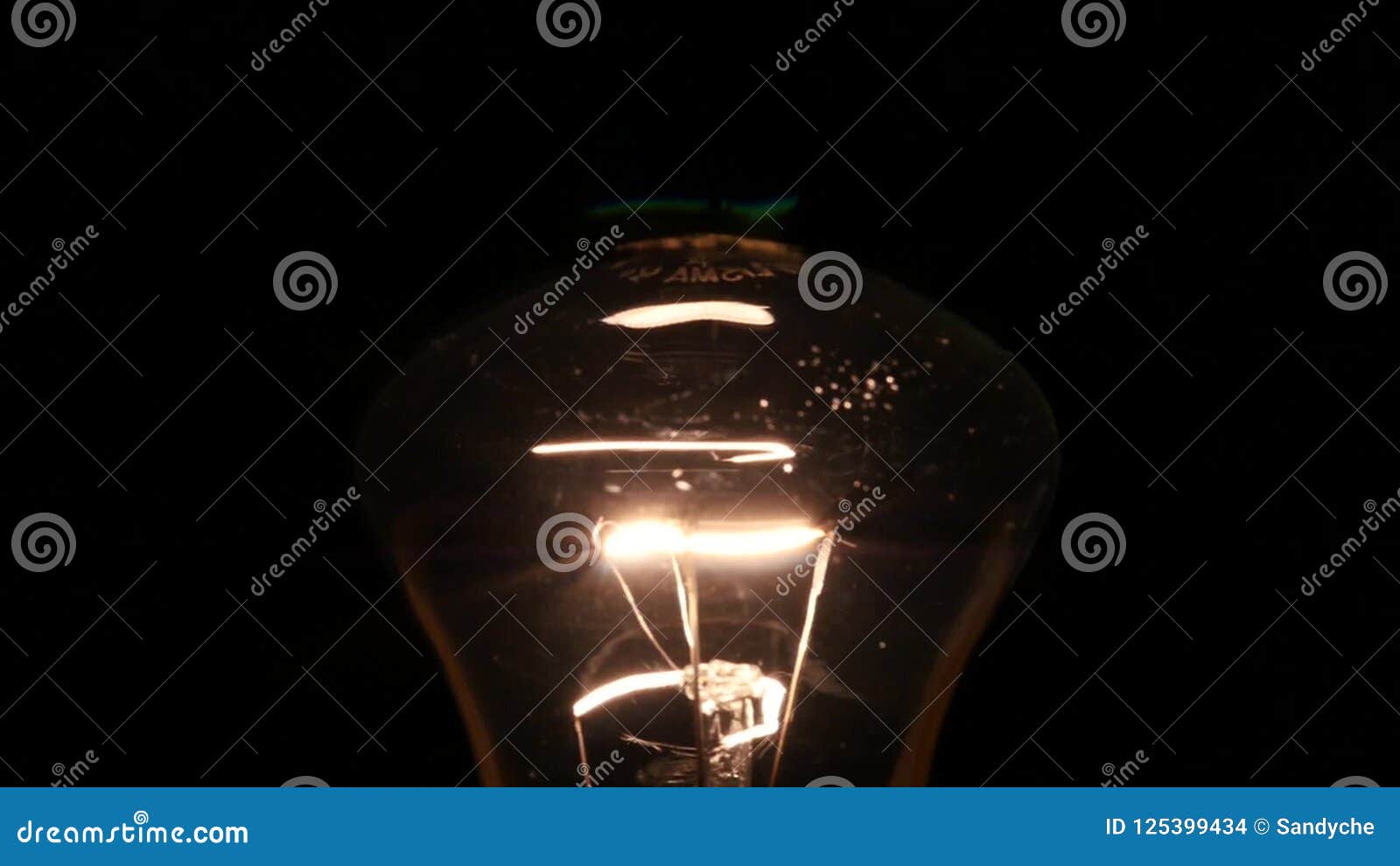 Light Bulb Turning on and Off on Black Background, Slow Motion Stock ...