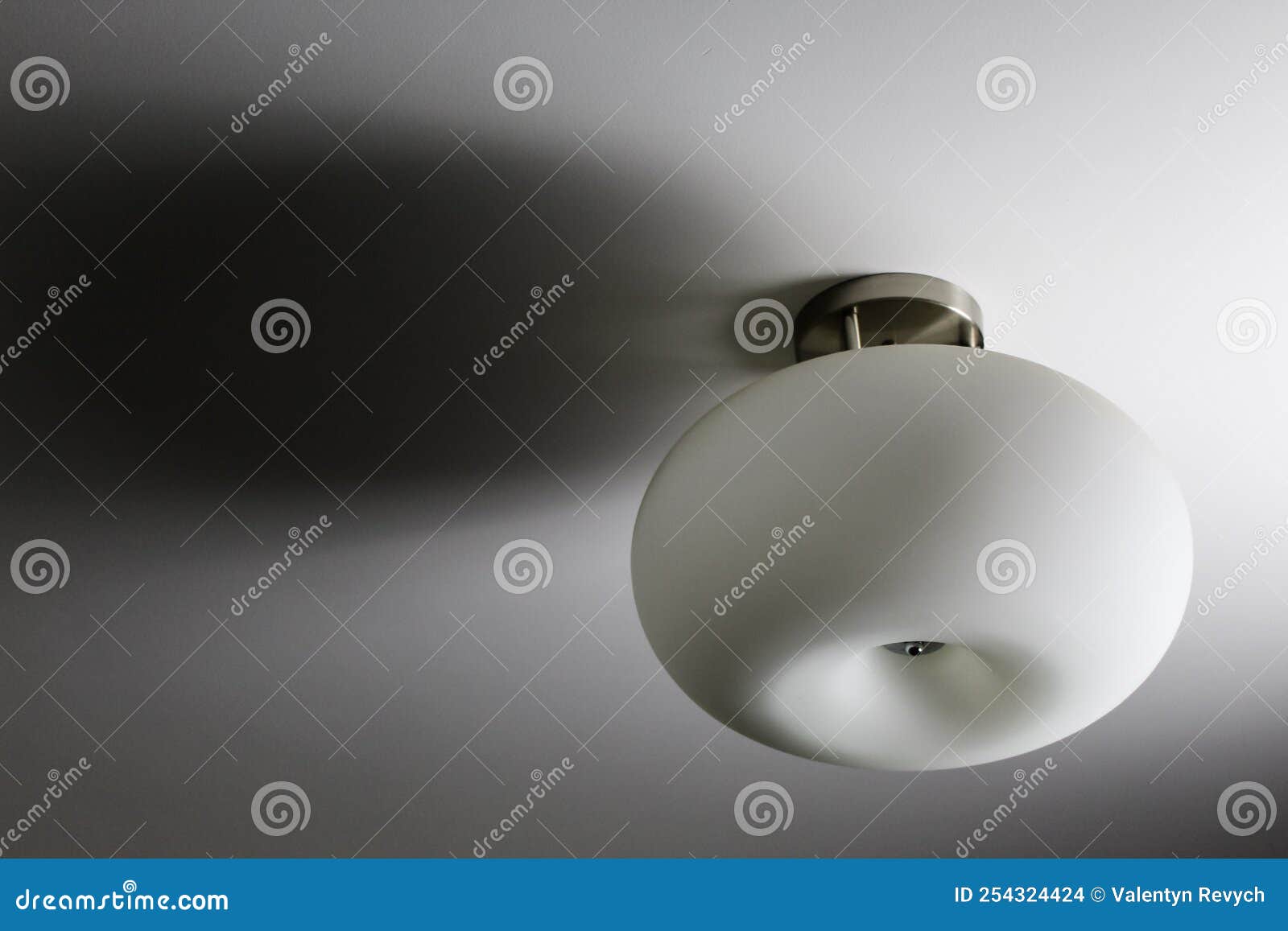 Light bulb on a wall stock photo. Image of ceiling, bulb - 254324424