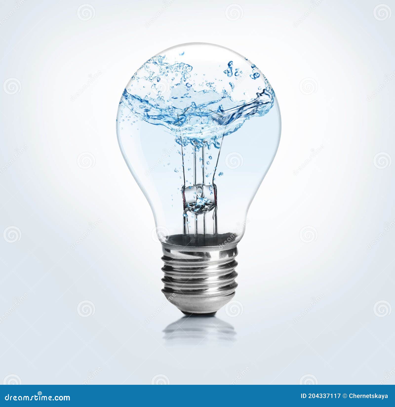 Light Bulb with Water Splashes on Light Background. Alternative Energy ...