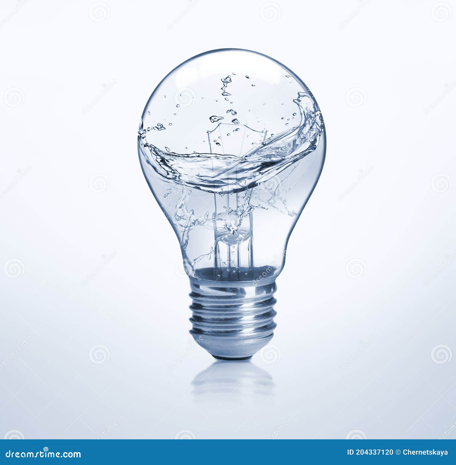 Light Bulb with Water Splashes on Light Background. Alternative Energy ...