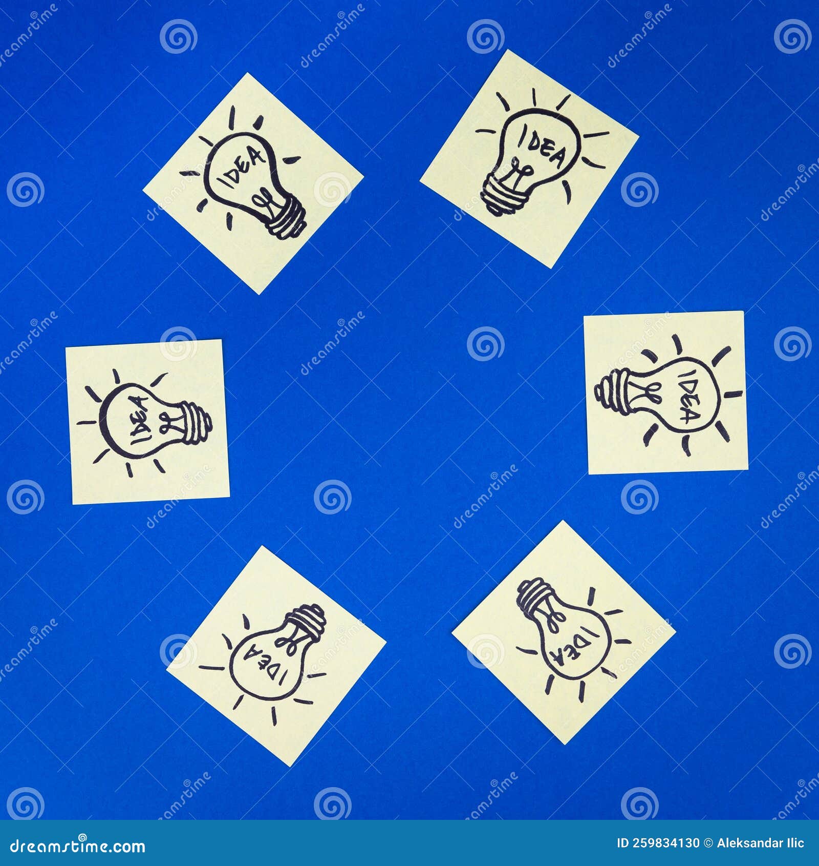 Light Bulbs Drawn on Sticky Notes Placed in a Circle with Empty Space ...