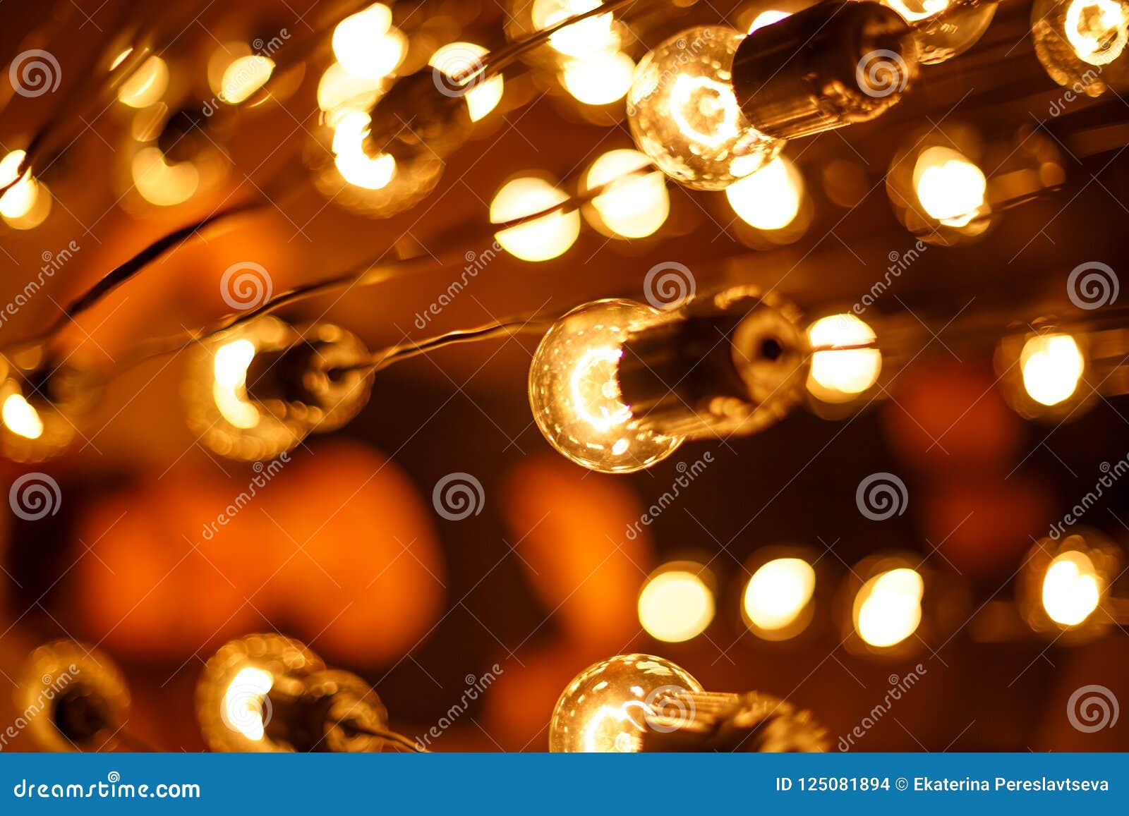 Light Bulbs Hang and Glow Soft Focus Stock Photo - Image of energy ...