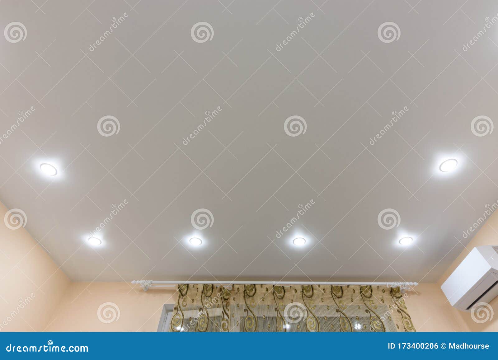 Light Bulbs Located on the Perimeter of the Stretch Ceiling Stock Photo ...