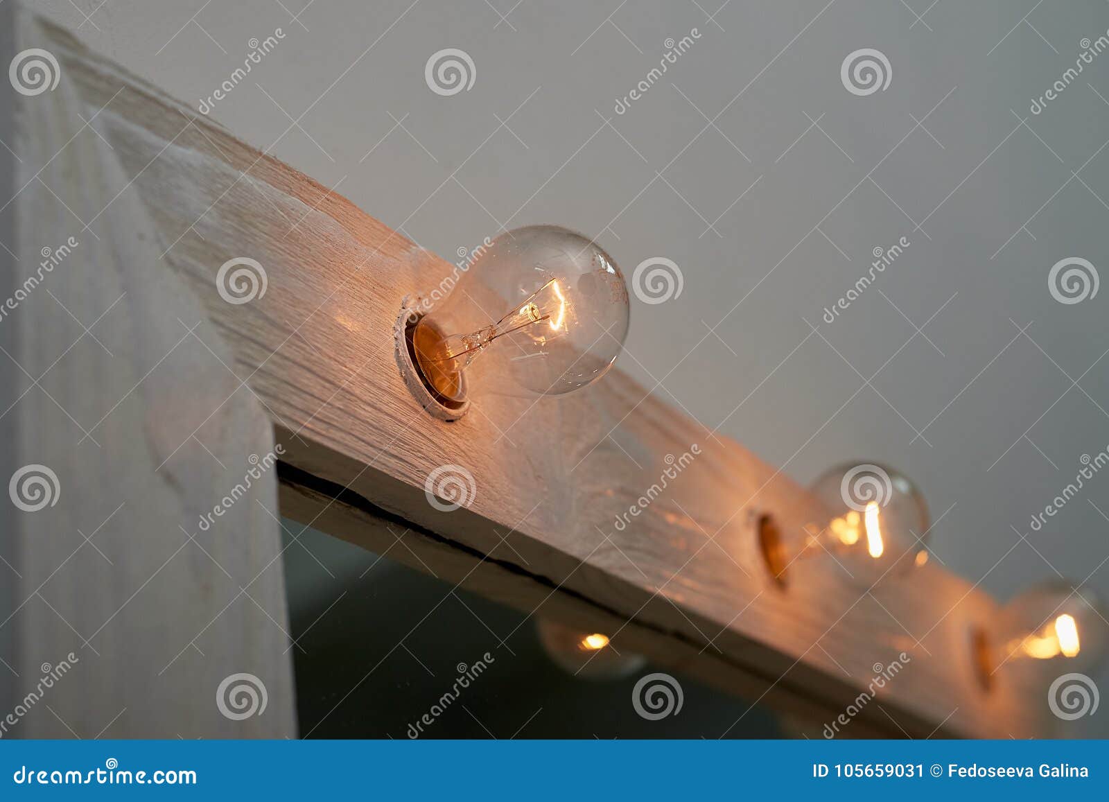 Light Bulbs in a Wooden Frame that Frames the Mirror.Dressing Room ...