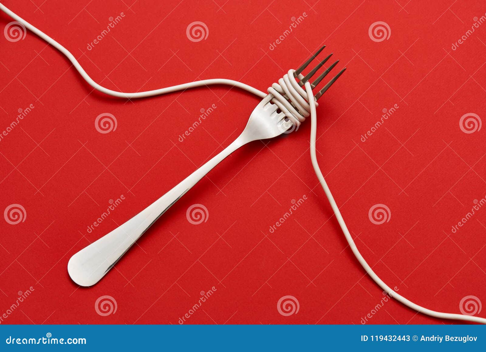 Fork wrapped with cable stock image. Image of silver - 119432443