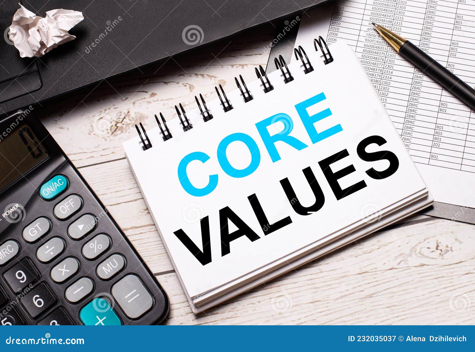 On a Light-colored Office Table is a Computer, a Black Calculator, a ...