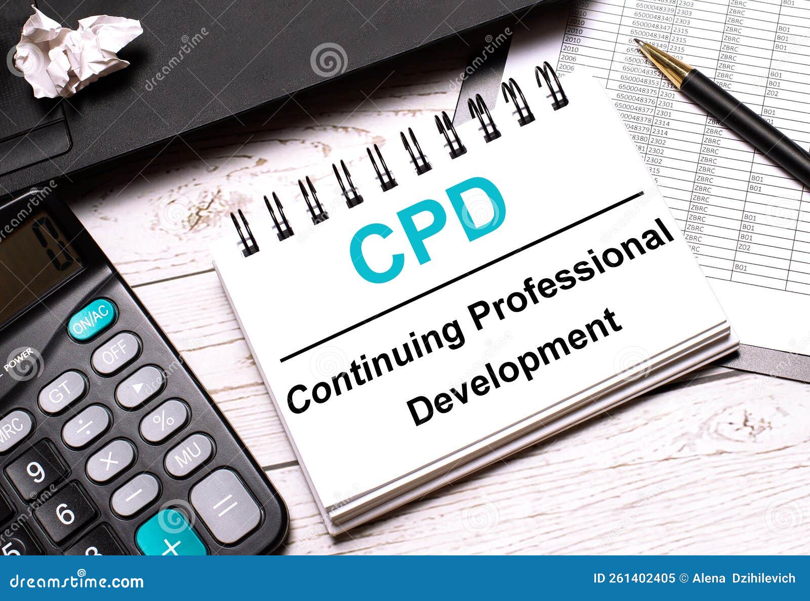 On a Light-colored Office Table is a Computer, a Black Calculator, a ...