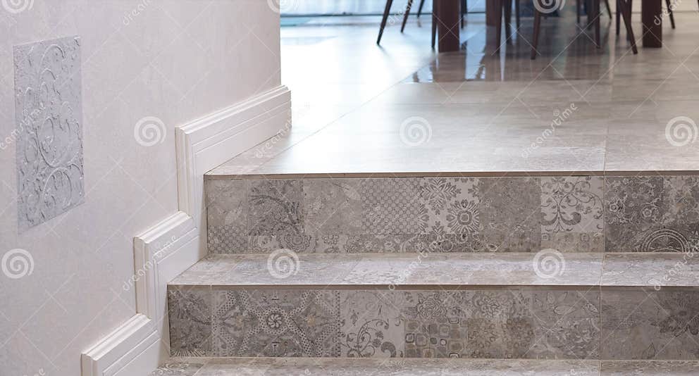 Light Colored Patterned Tile Steps in House. Decorative Putty ...