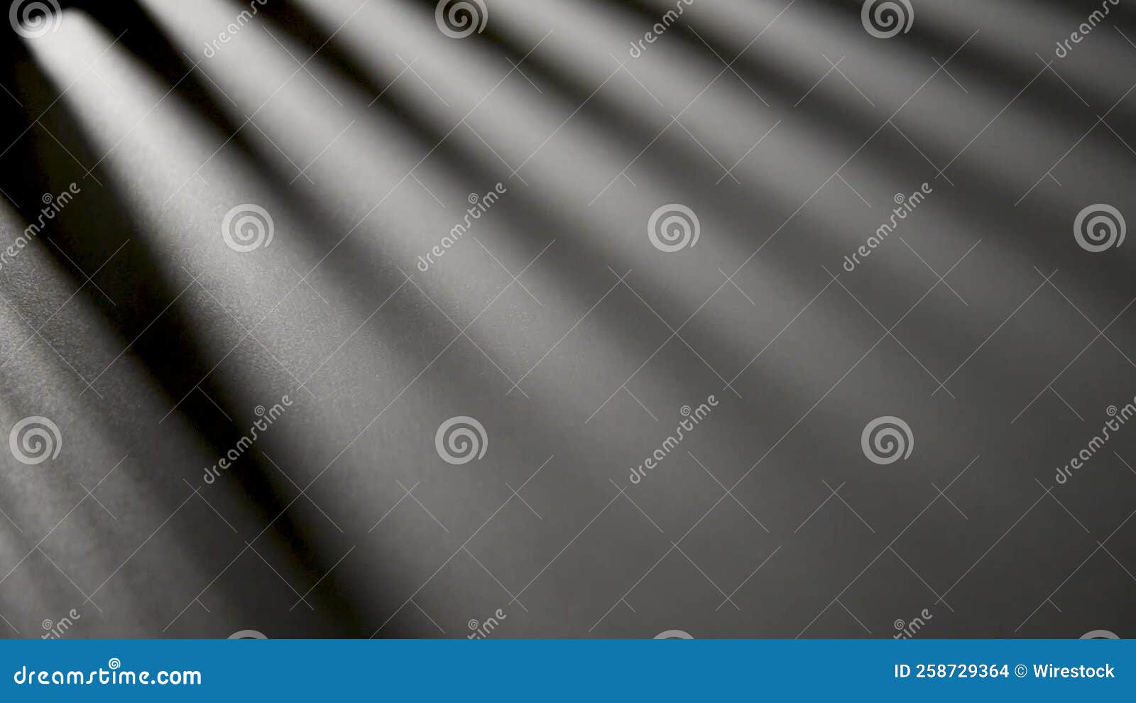 Light Coming Behind the Fence and Making Shadow Trails on a Silver ...