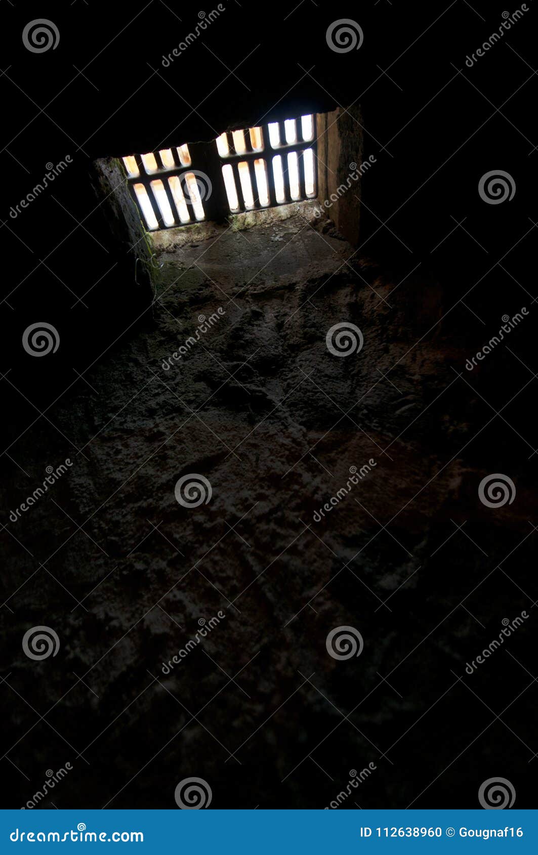 Light Coming Down Underground through a Metallic Grid Stock Photo ...