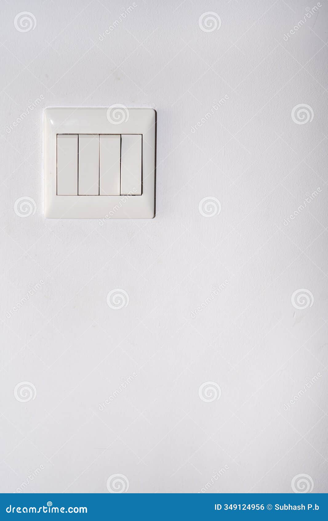 Light Control Switch White Color Installed on the White Color Wall ...