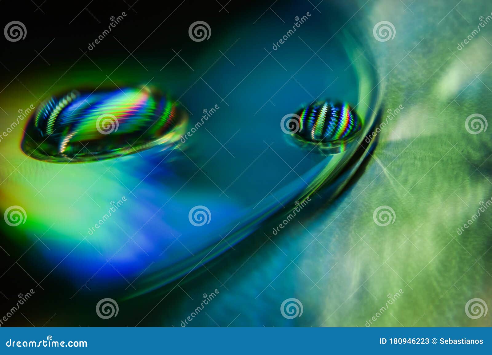 Light Diffraction Showing Rainbows on Water Drops Stock Image - Image ...