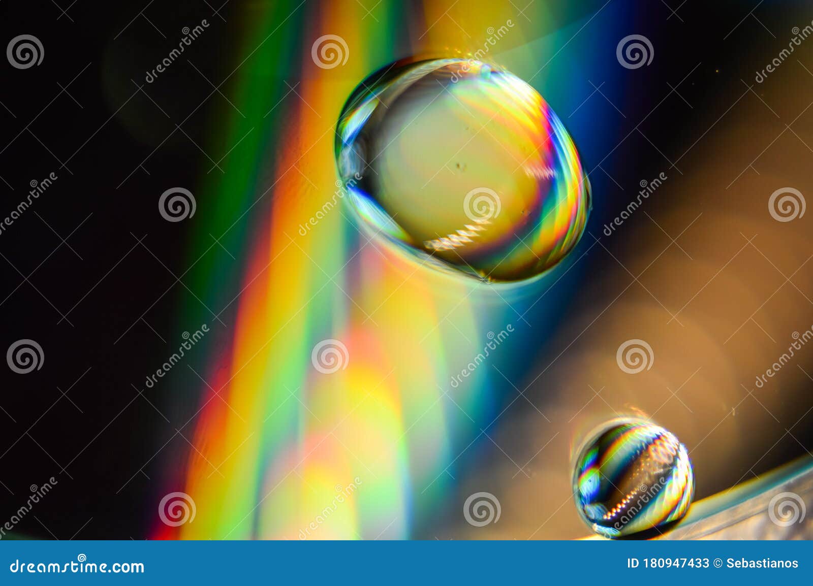 Light Diffraction Showing Rainbows on Water Drops Stock Image - Image ...