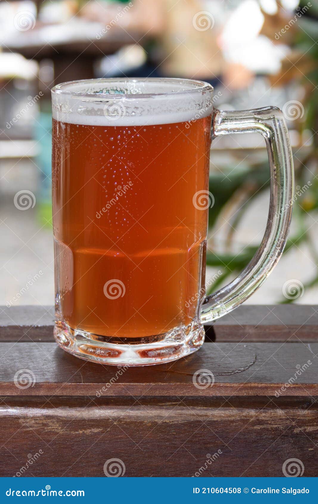 Light draft beer on mug stock photo. Image of hour, glass - 210604508