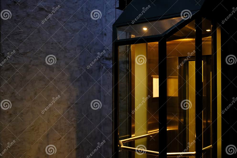 Light from Elevator Shining through on the Wall. Stock Photo - Image of ...