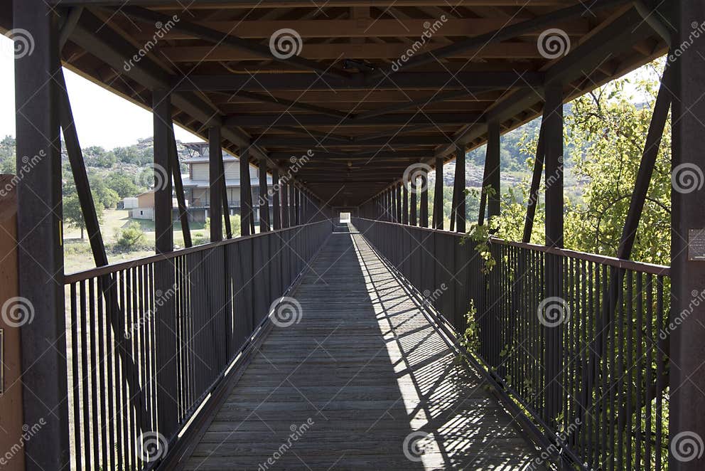 Light at end of bridge stock image. Image of reduces - 55969457