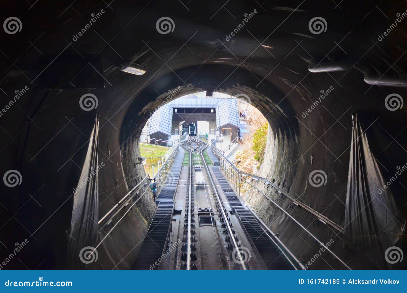 Light at the End of the Tunnel Concept - Train Exit from an Underground ...