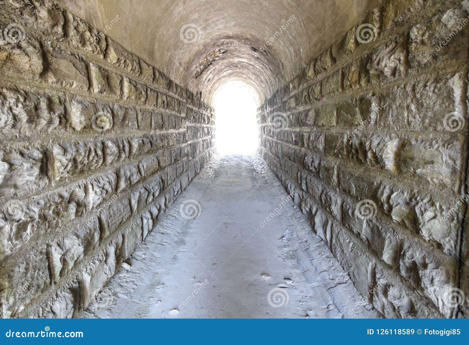 A Light in the End of a Tunnel. Passage Under the Railway Stock Image ...