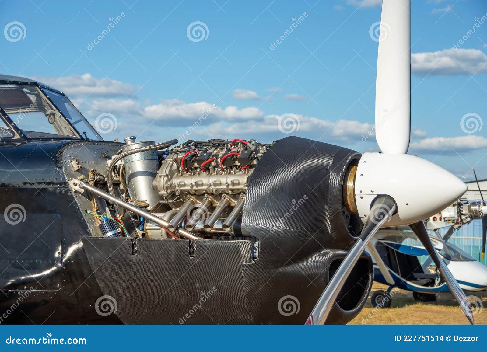Light Engine Aircraft with an Open Engine Hood, the Device is the ...