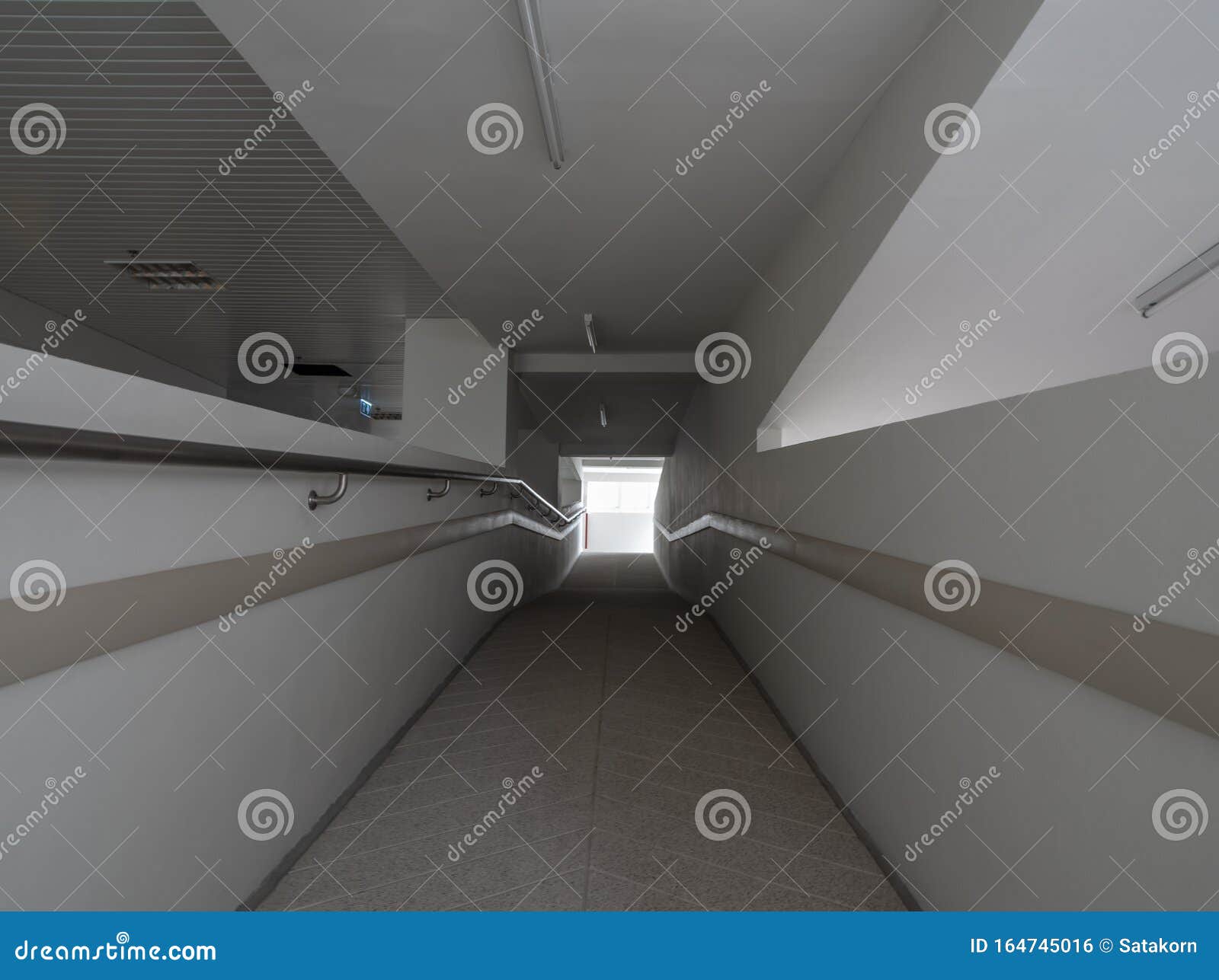 Light at the Exit of the Corridor in the Building Stock Photo - Image ...