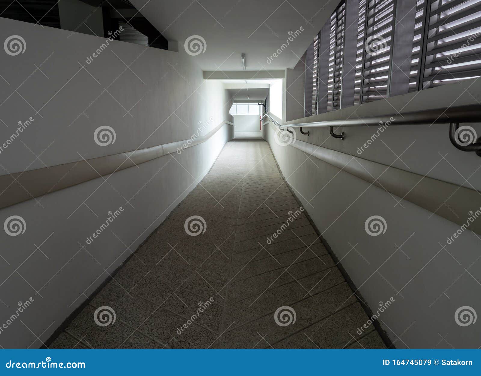 Light at the Exit of the Corridor in the Building Stock Image - Image ...